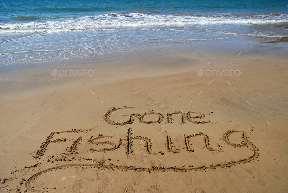 Gone Fishing, message written in the sand on the beach Magnetic Island ...