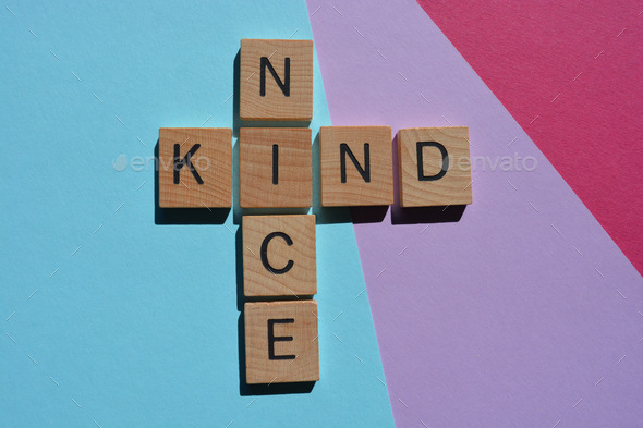 Nice, Kind. Words in 3D wooden alphabet letters in crossword form on ...