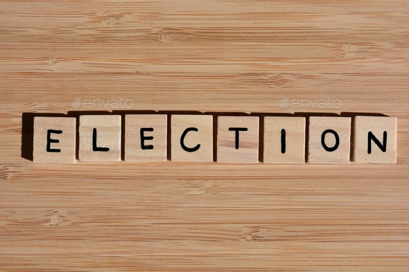 Election, word in 3D wooden alphabet letters on a bamboo wood ...