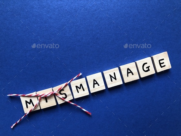 Mismanage in 3D wooden alphabet letters with Mis crossed out and ...