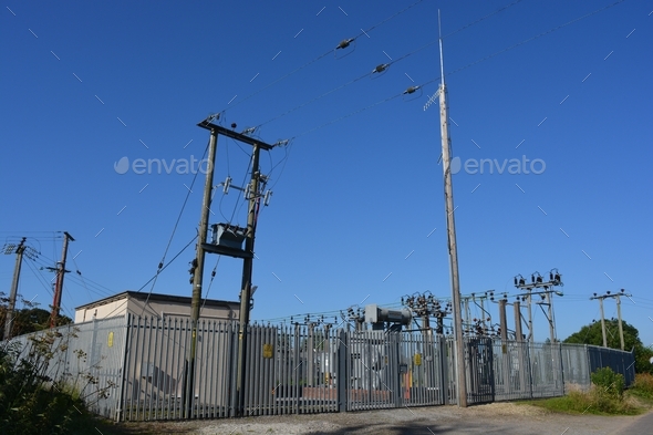 Electricity substation with high voltage warning signs on perimeter ...