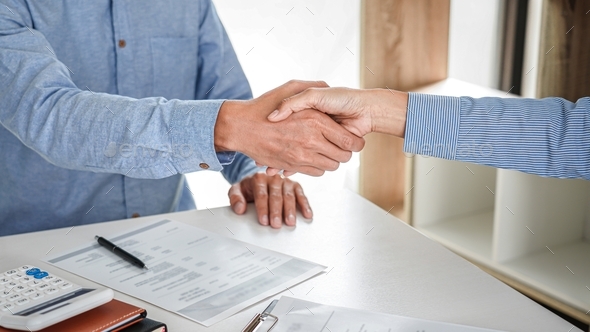 Male candidate shaking hands with Interviewer or employer after a job ...