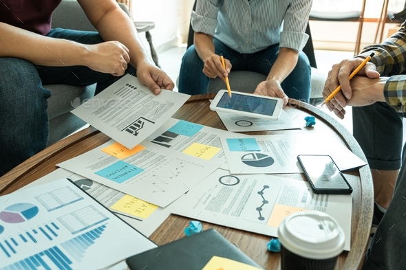 Business partner team working and analyzing data with new marketing ...