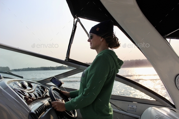Women on the boat, lakeshore, boating, women. Stock Photo by NatalieZera
