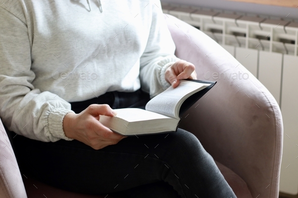 Studying the Bible, reading the scriptures. Stock Photo by NatalieZera
