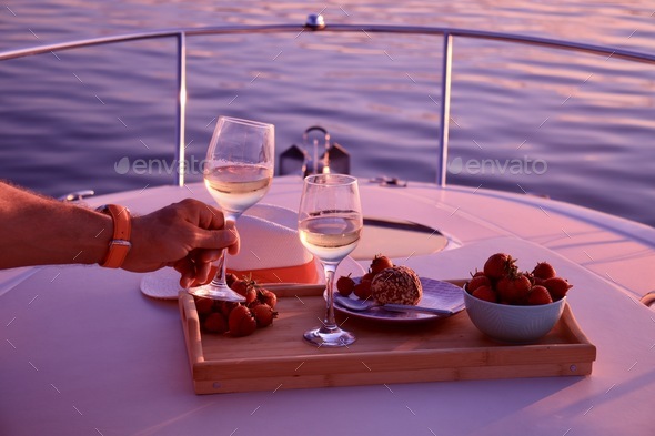 Celebrating on a boat. Relaxing moments.Romance,summer time. Stock ...