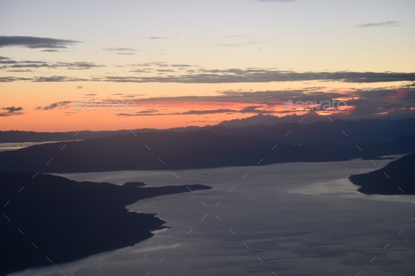 Unfiltered pictures of a Juneau Alaska sunset from an airplane 3 Stock Photo by Malisunshine