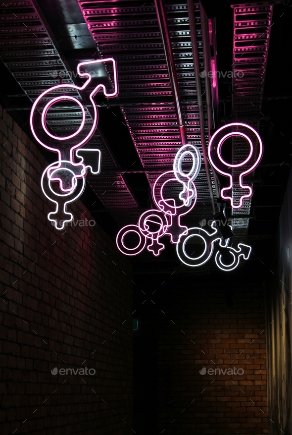 Neon gender symbols - a combination of Mars (male) and Venus (female ...