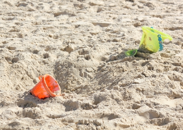 Sand buckets on the beach Stock Photo by iheartcreative | PhotoDune