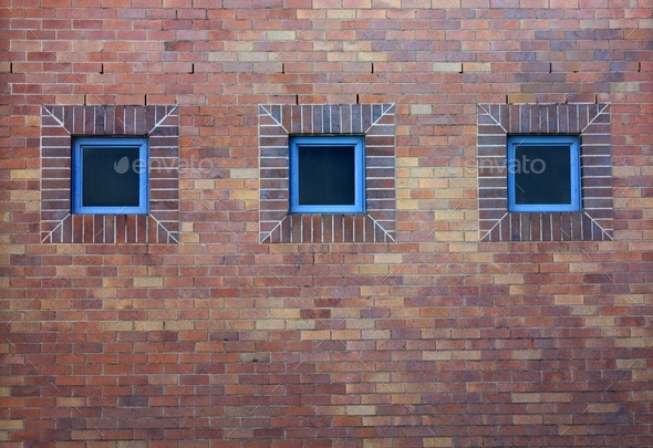 Minimalism three square windows on a brick wall Stock Photo by ...