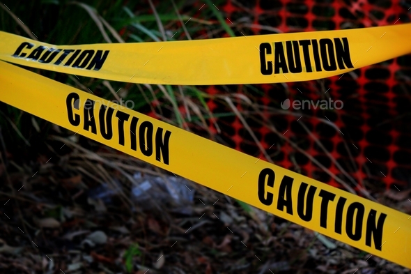 Yellow caution tape that goes around a crime scene or construction site ...