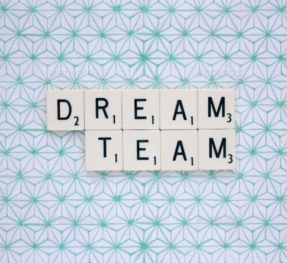 The words Dream Team spelled out, flat lay style, in Scrabble letters ...