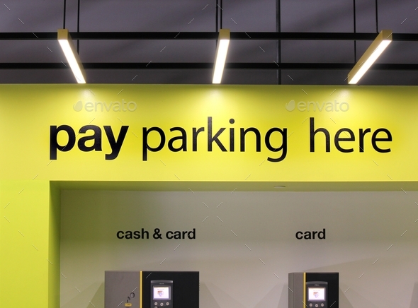 Pay Parking here signage in a public parking garage Stock Photo by ...