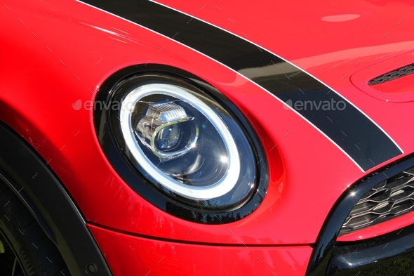 Headlight and grille of the new Mini Cooper automobile Stock Photo by ...