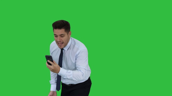 Angry businessman yelling at phone on a Green Screen, Chroma Key ...