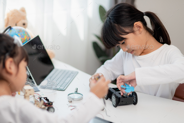 Asia students learn at home in coding robot cars and electronic board ...