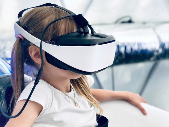 Futuristic, scenic, virtual reality, a little girl is using a virtual ...