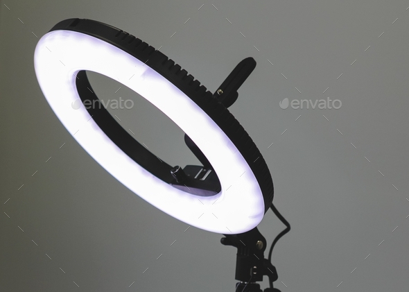 White ring light against a plain white background Stock Photo by ...