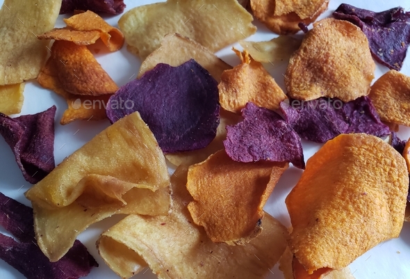Colorful chips made from variety of root vegetables, taro root, beets ...