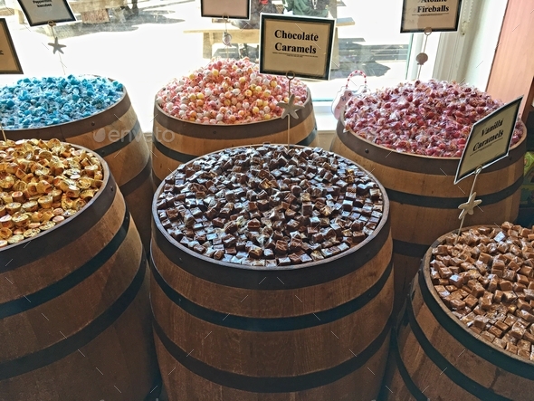 Large volume of candy on display in barrels, sugar overload Stock Photo ...
