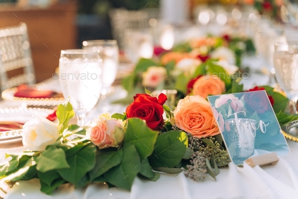 Romantic tablescape with red roses table setting for wedding event ...