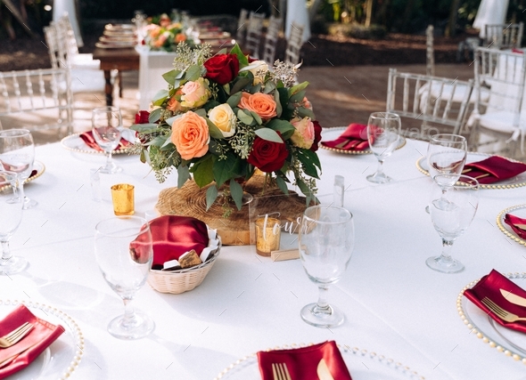 Romantic tablescape with red roses table setting for wedding event ...