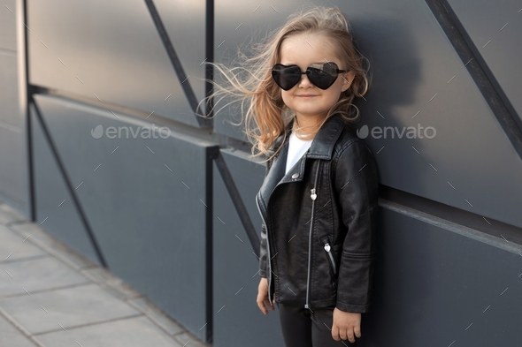 Little girl rock star posing Stock Photo by evgeniya_grande | PhotoDune