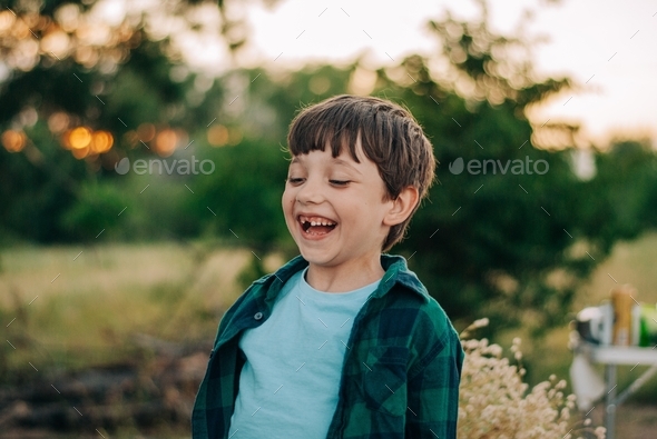 Little laughing kid boy with broad smile vibrant and happy mood image ...