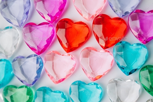 Close-up view of shiny sparkling stones with heart shape of different ...
