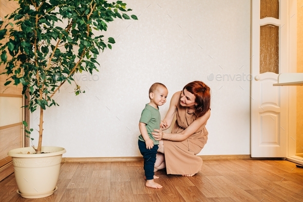 Funny family moments of mom and her son little kid baby boy indoors at ...