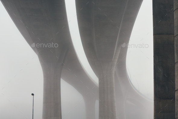 Pillars of the highway bridge in mysterious morning fog. Prague, Czech ...