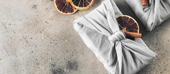 Holiday eco-friendly reusable gift packaging by dry orange and cinnamon ...