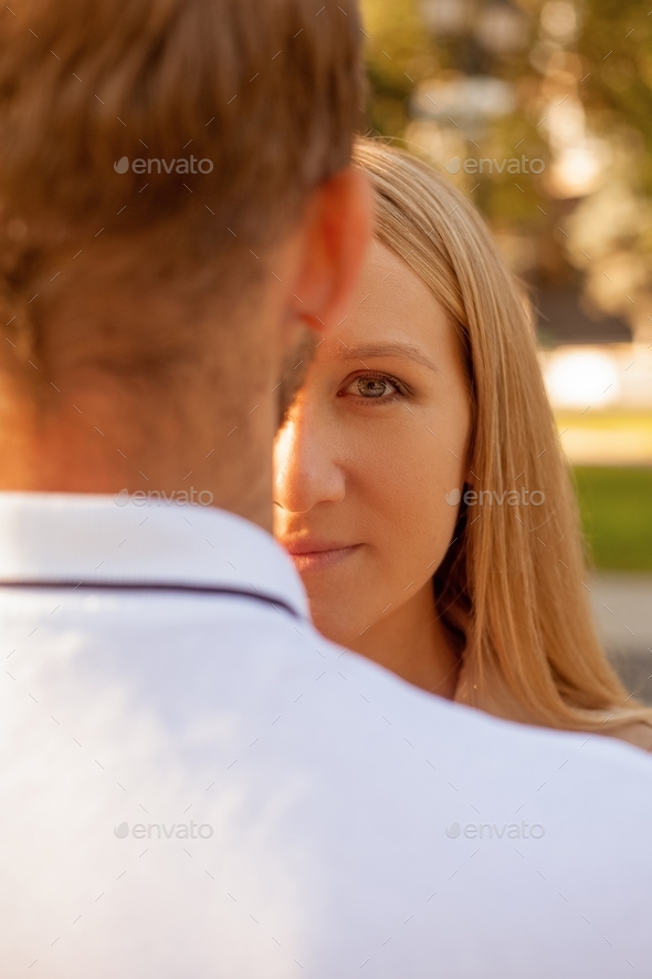 girl peeking over man's shoulder Stock Photo by loskyt7 | PhotoDune