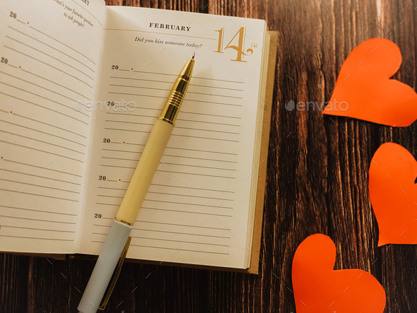 Open notebook with monthly dates and pencil Stock Photo by VictoriaColin