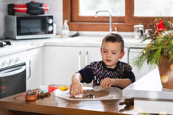 Christmas and New Year bakery. Kids hands cooking traditional ...