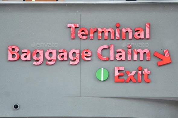 Terminal baggage claim sign at the airport Stock Photo by maginnislaura
