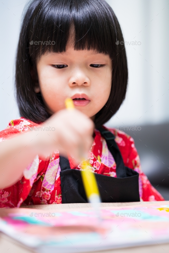 Portrait of student child painting on paper art. Little artist girl ...