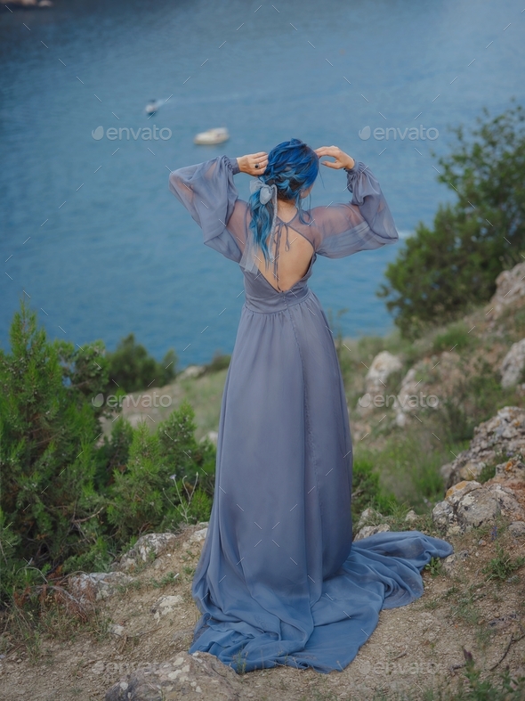 Fashion photos. sea nymph wind listening wind Stock Photo by selenitphoto