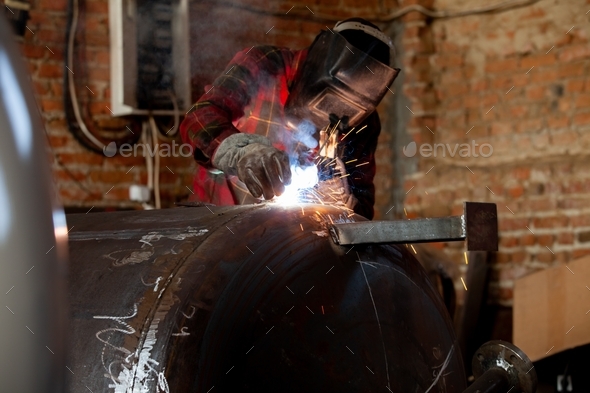welding works in the workshop, metal welding, heavy industry Stock ...