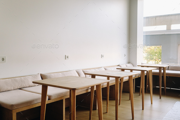 Tables standing in the interior. Places to sit in a cafe Stock Photo by ...