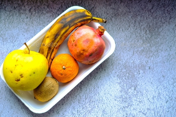 Spoiled old decayed damaged ugly rotten fruit. Stock Photo by ...