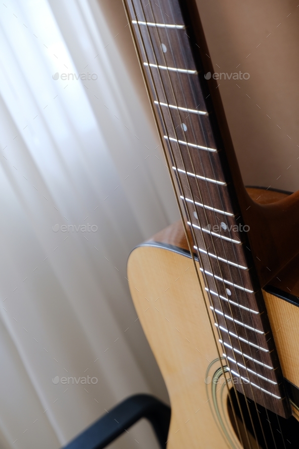 Guitar fretboard, strings and frets. Stringed musical instrument. The ...