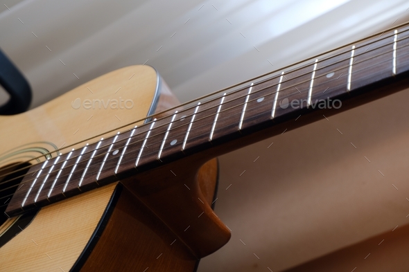 Guitar fretboard, strings and frets. Stringed musical instrument. The ...