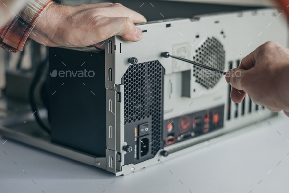 Repair and modernization of computers. Installing the power supply in ...