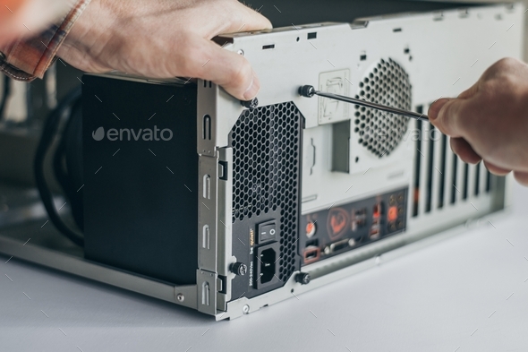 Installing the power supply in the system unit. Repair and ...