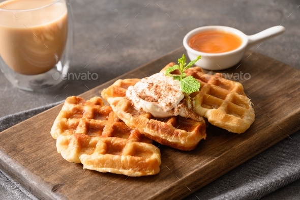 Popular croffles for delicious breakfast with maple syrup. Croissant as ...