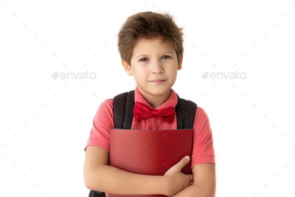 Schoolboy with smiling happy face with copy space. Pupil with a ...