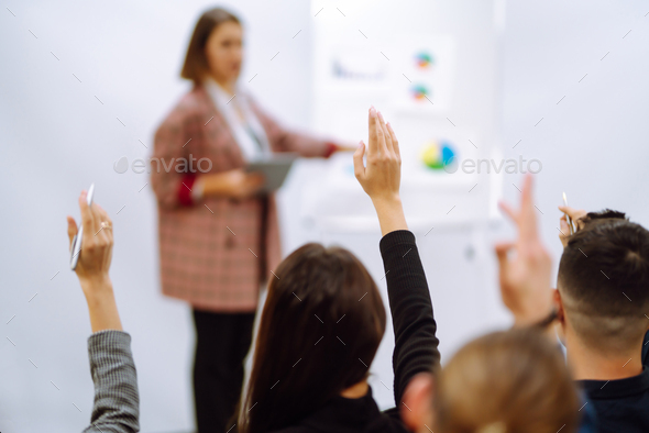 Business people raising hand up to ask question with speaker Stock ...