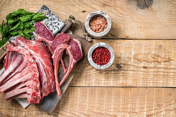 Raw lamb, mutton chops steaks, ribs rack. Stock Photo by composter-box