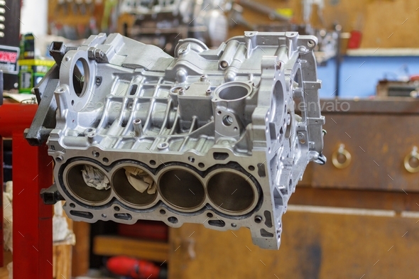 Toyota engine block in a mechanical worshop Stock Photo by LeaMallo